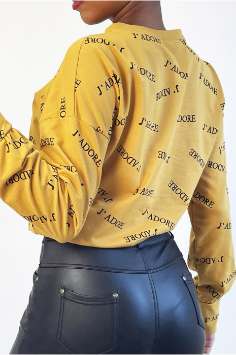 Haut moutarde avec lacet à la taille et écriture J'adore