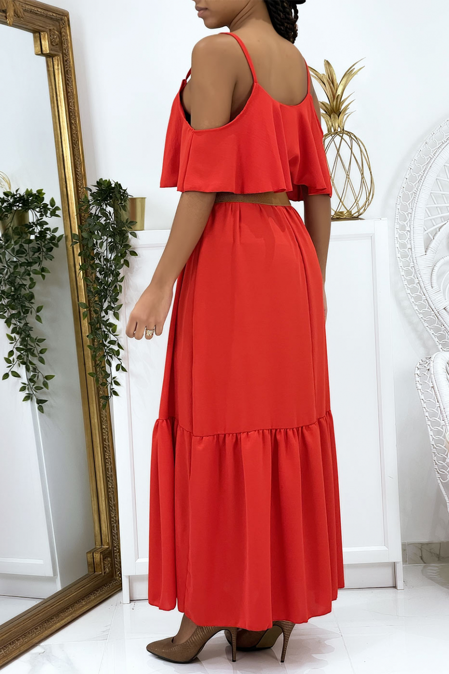 Long flared red dress with flounces and straps