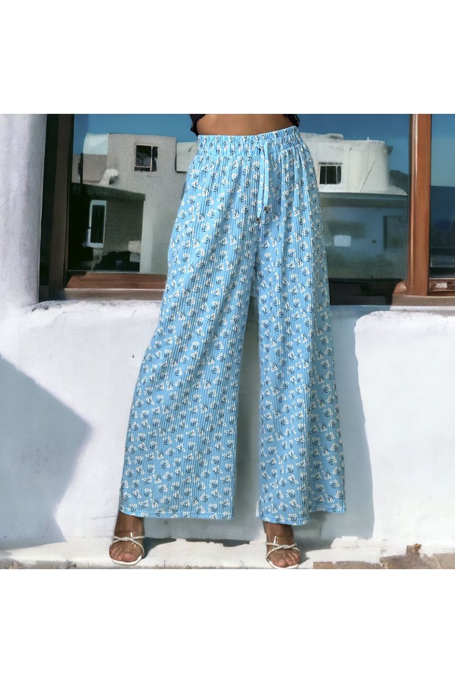 Blue pleated palazzo trousers with pattern